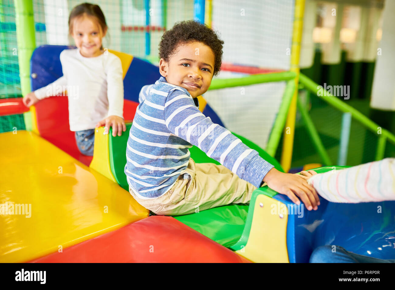 Little Boy Enjoying Slides Stock Photo - Alamy