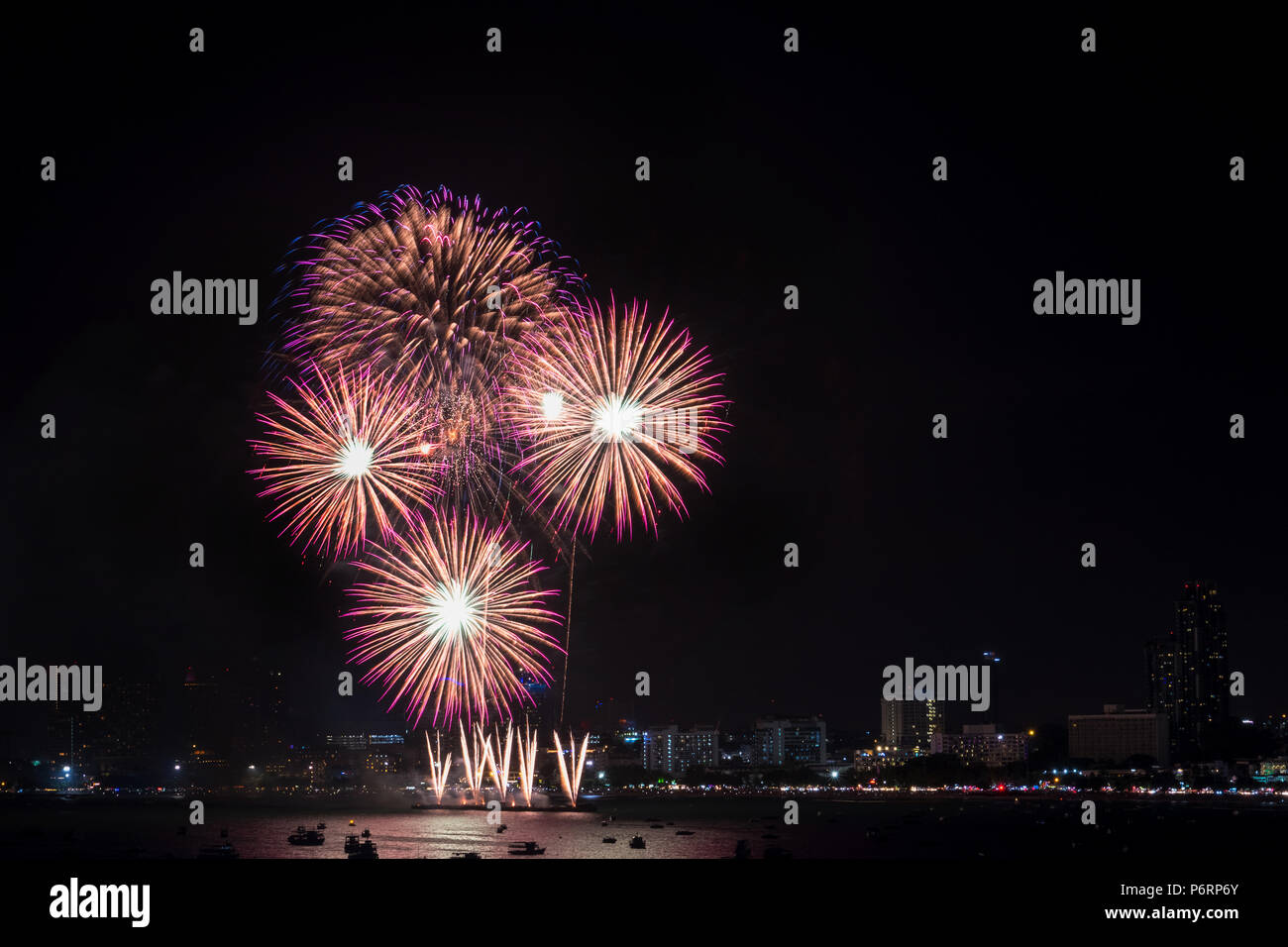 Fireworks explored over cityscape at night in Pattaya International ...