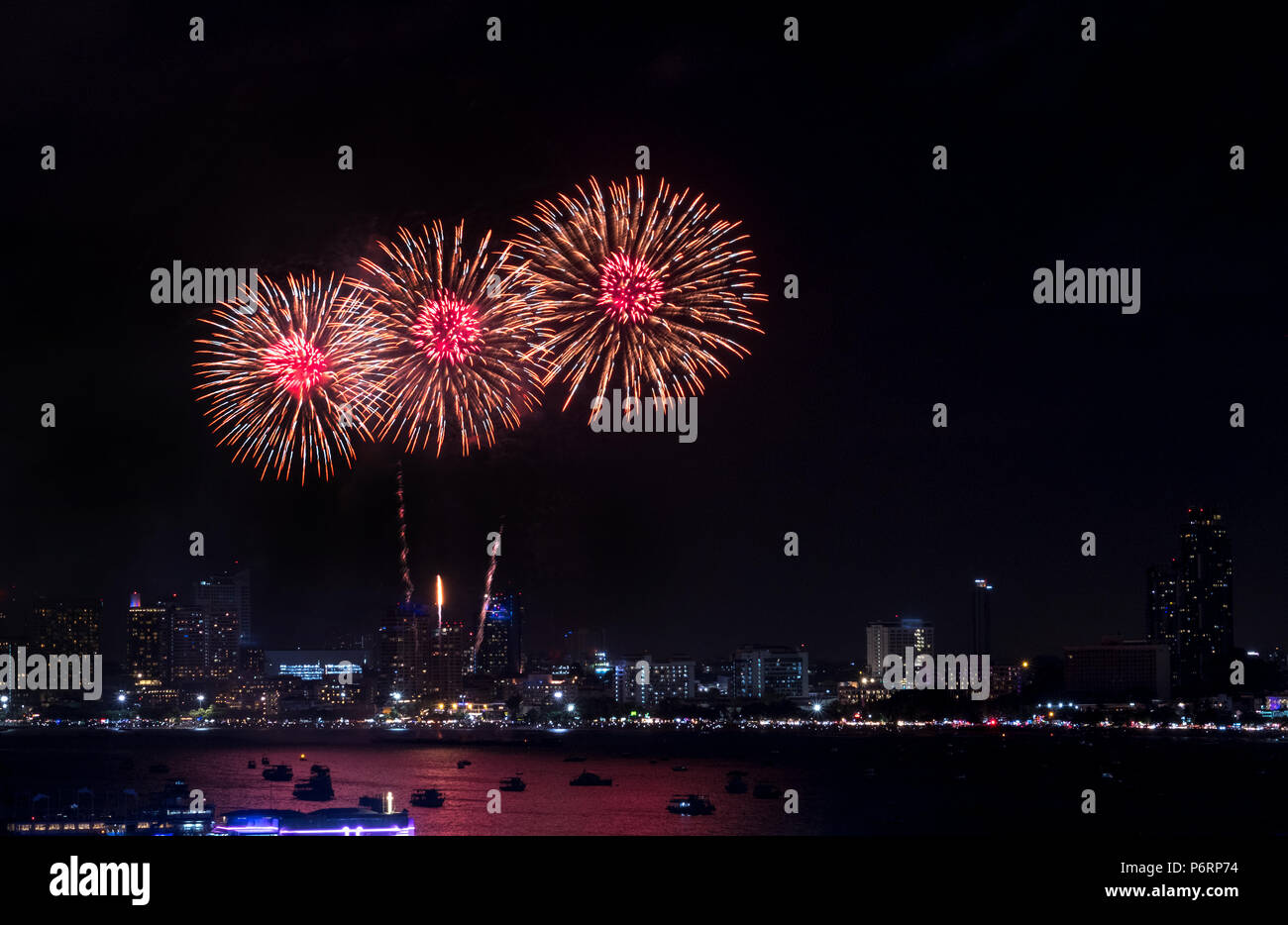 Fireworks explored over cityscape at night in Pattaya International ...