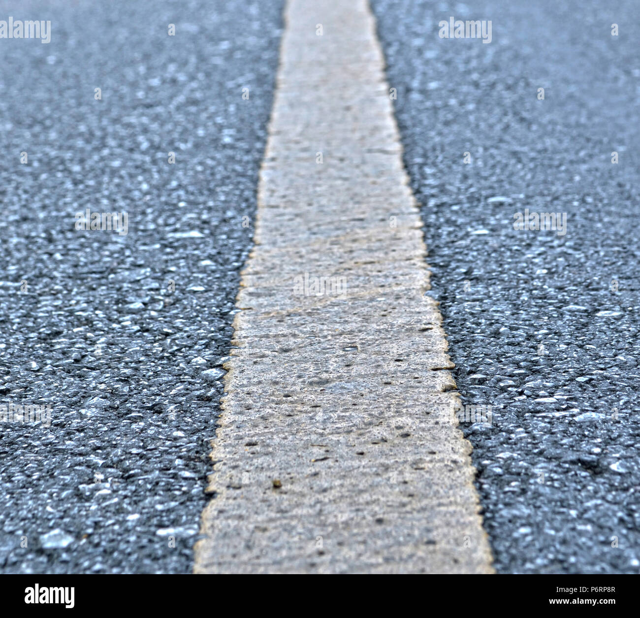 Asphalt road texture with yellow stripe Stock Photo - Alamy