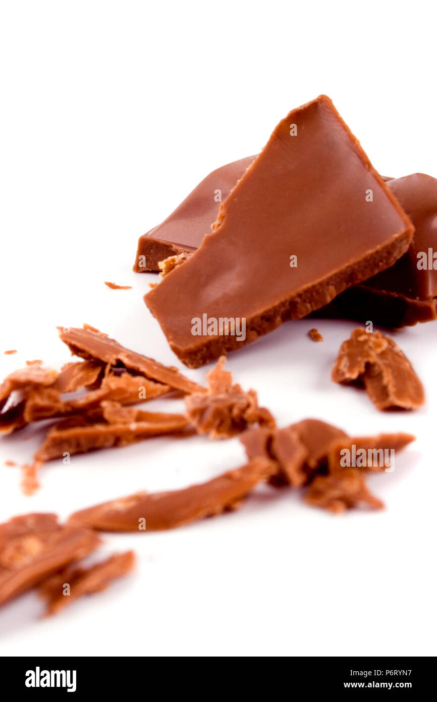pile of broken milk chocolate blocks Stock Photo - Alamy