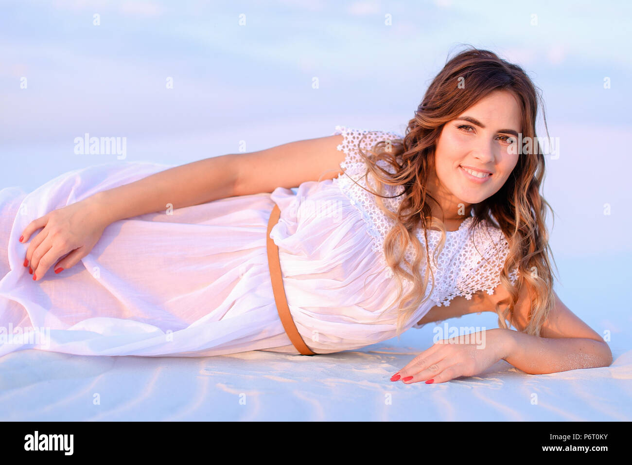 Woman lying in desert hi-res stock photography and images - Alamy
