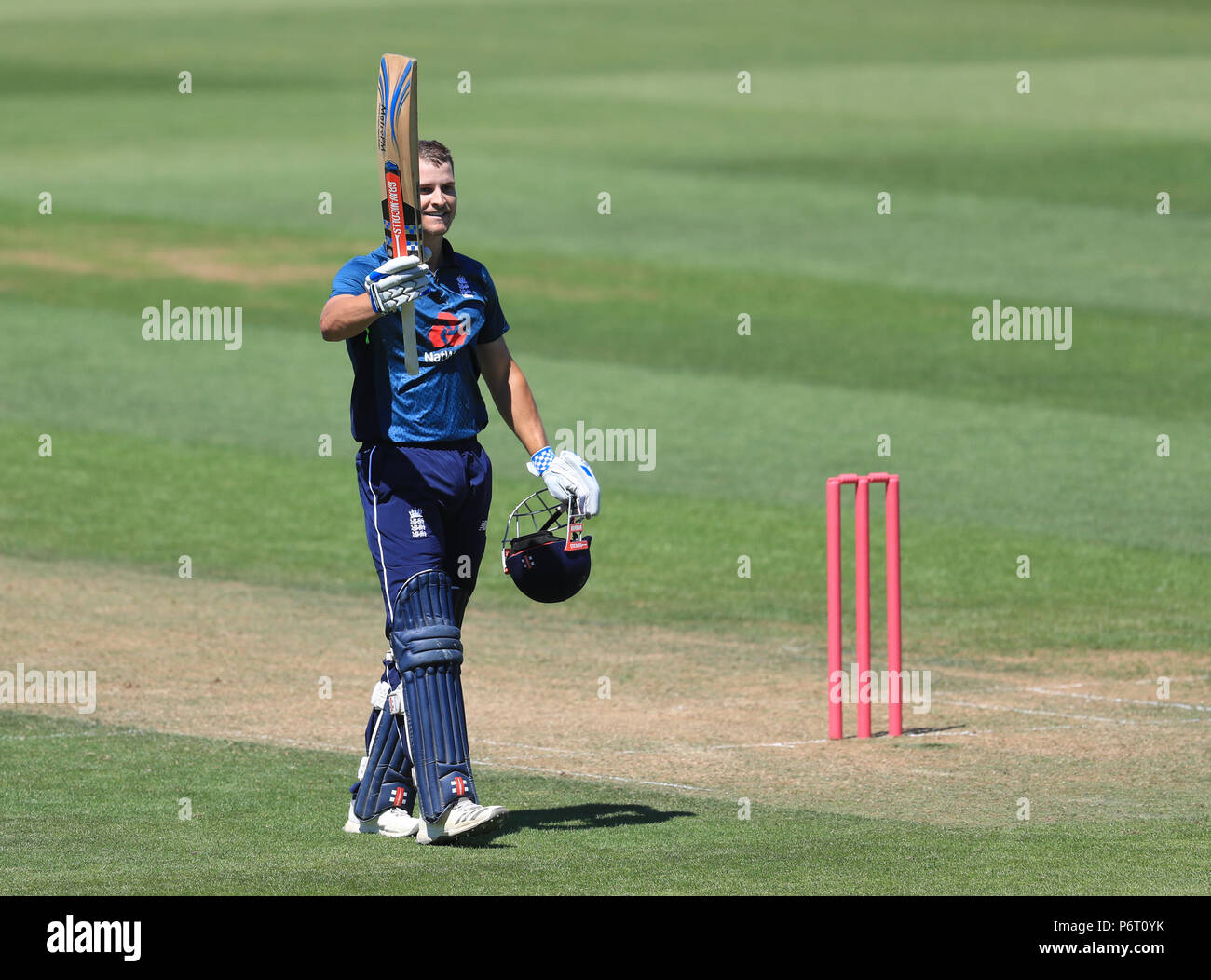 England's Sam Hain celebrates his century during the International A ...