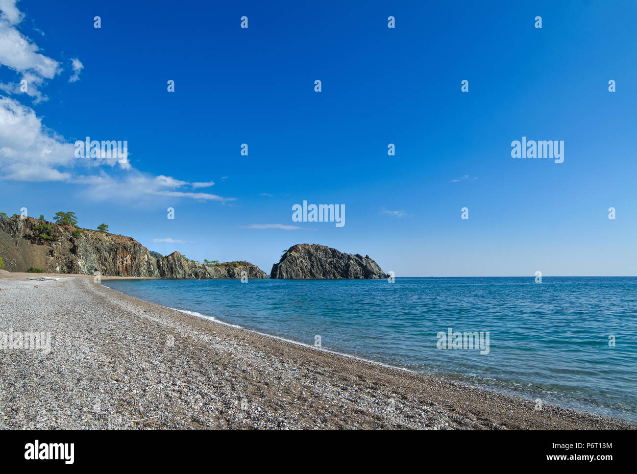 Pebble beach in Turkey on the Mediterranean coast Stock Photo - Alamy