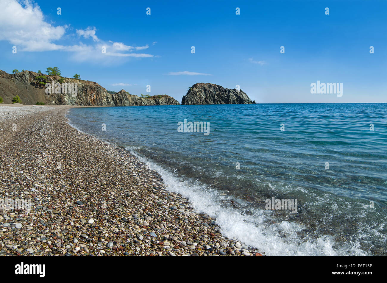 Pebble beach in Turkey on the Mediterranean coast Stock Photo - Alamy