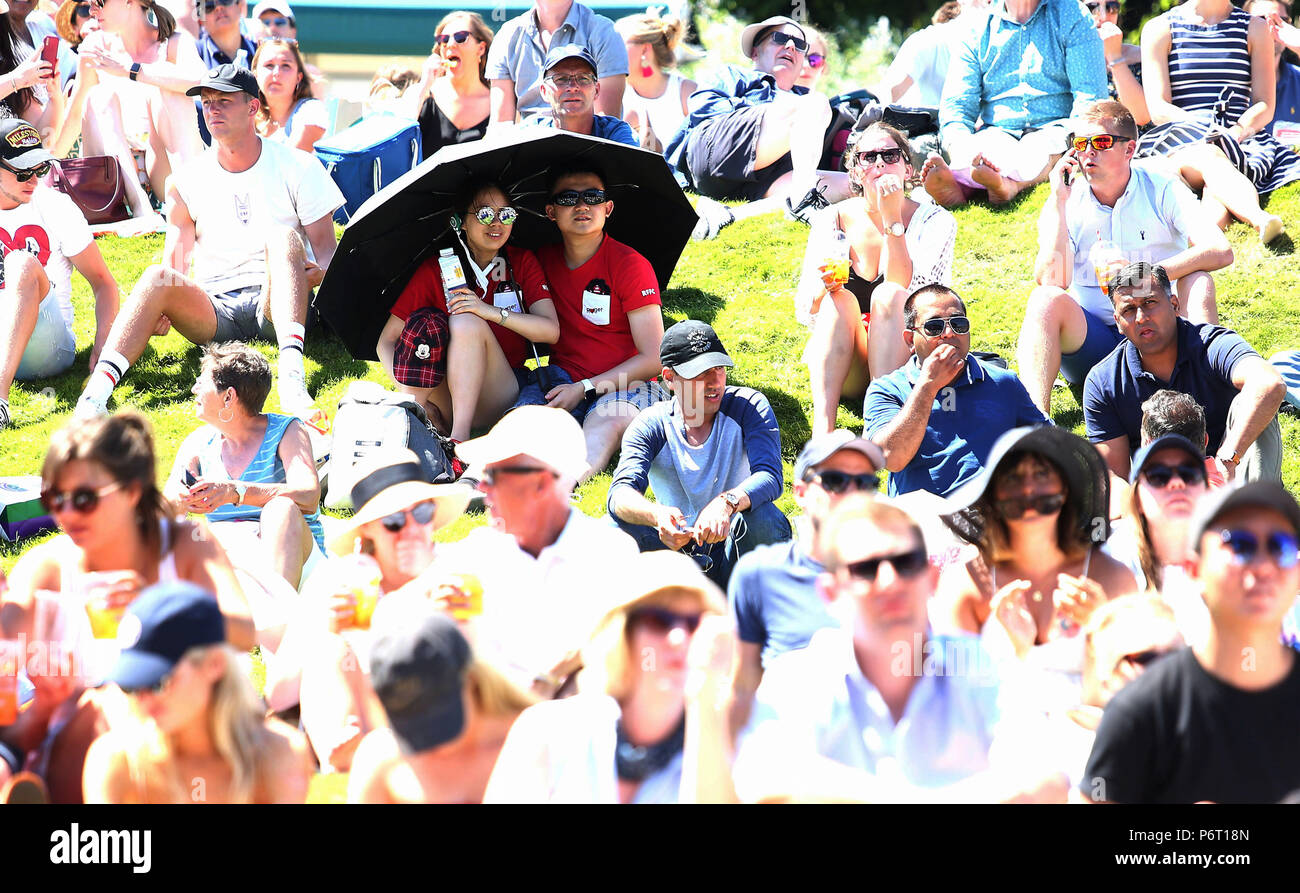 Spectators on Murray Mound watch the big screen on day one of the ...