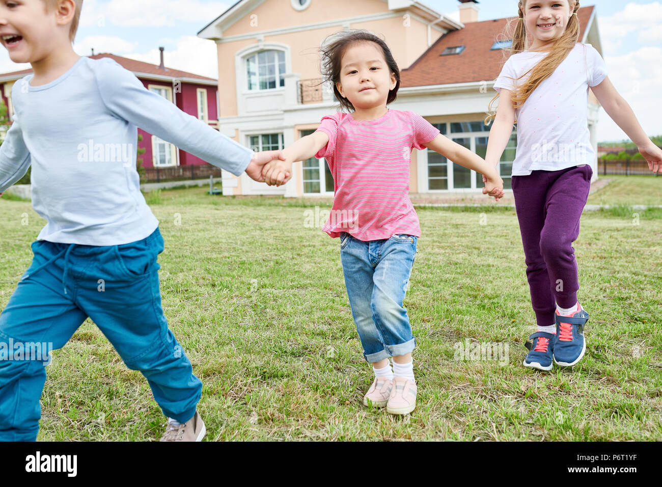 Happy Kids Playing Outdoors Stock Photo - Alamy