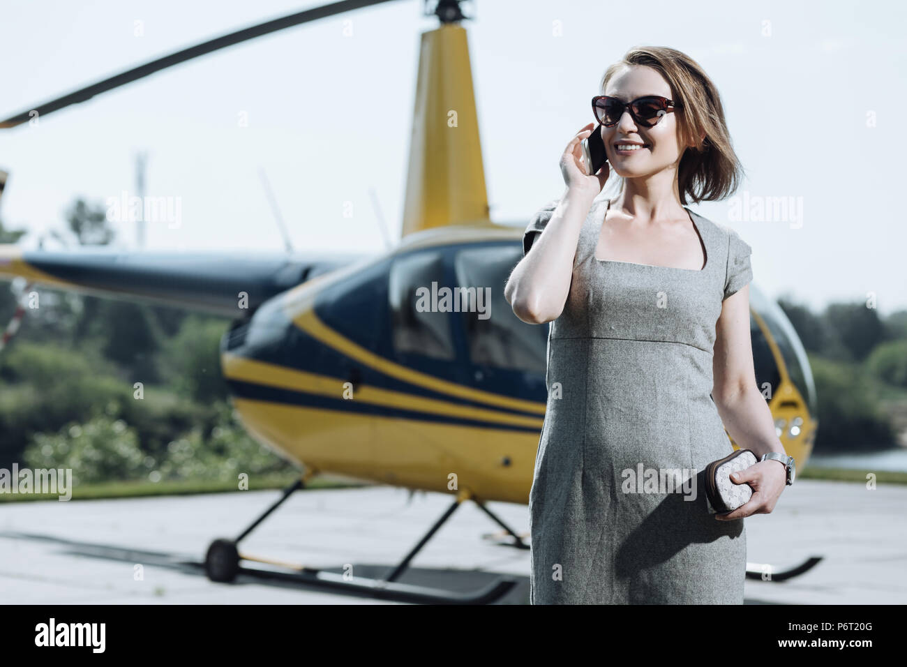 Women Getting In Helicopter Dress Blowing Up