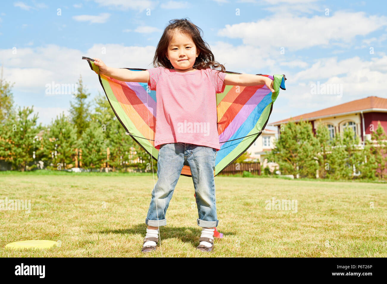 Asian Girl Playing with Kite Stock Photo - Alamy