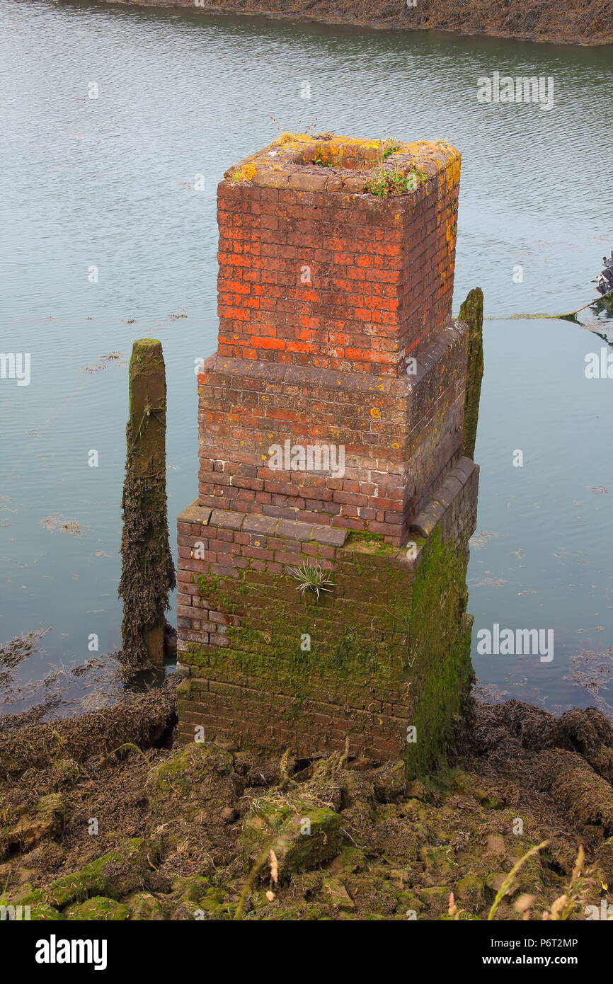 A brick built tall pillar which is either a vent or access manhole ...