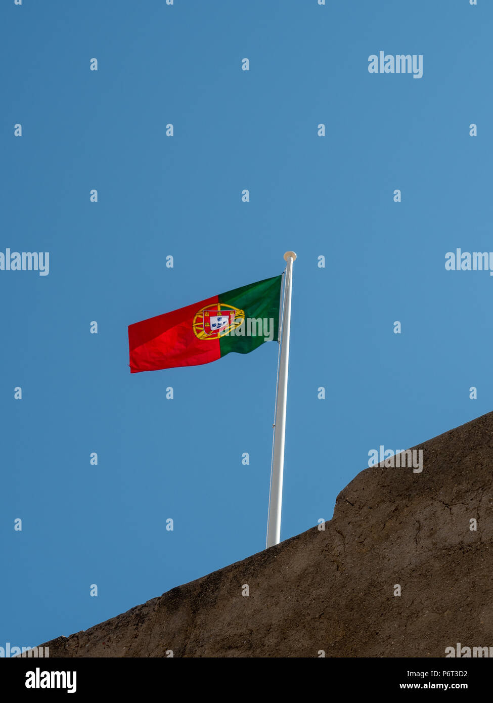 Portuguese flag at Castro Marim Castle, Algarve, Portugal Stock Photo ...