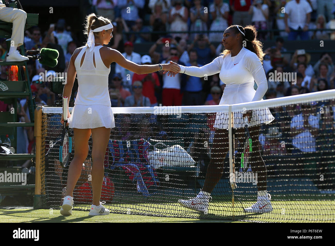 Serena Williams (right) shakes hands with Arantxa Rus after her win on ...