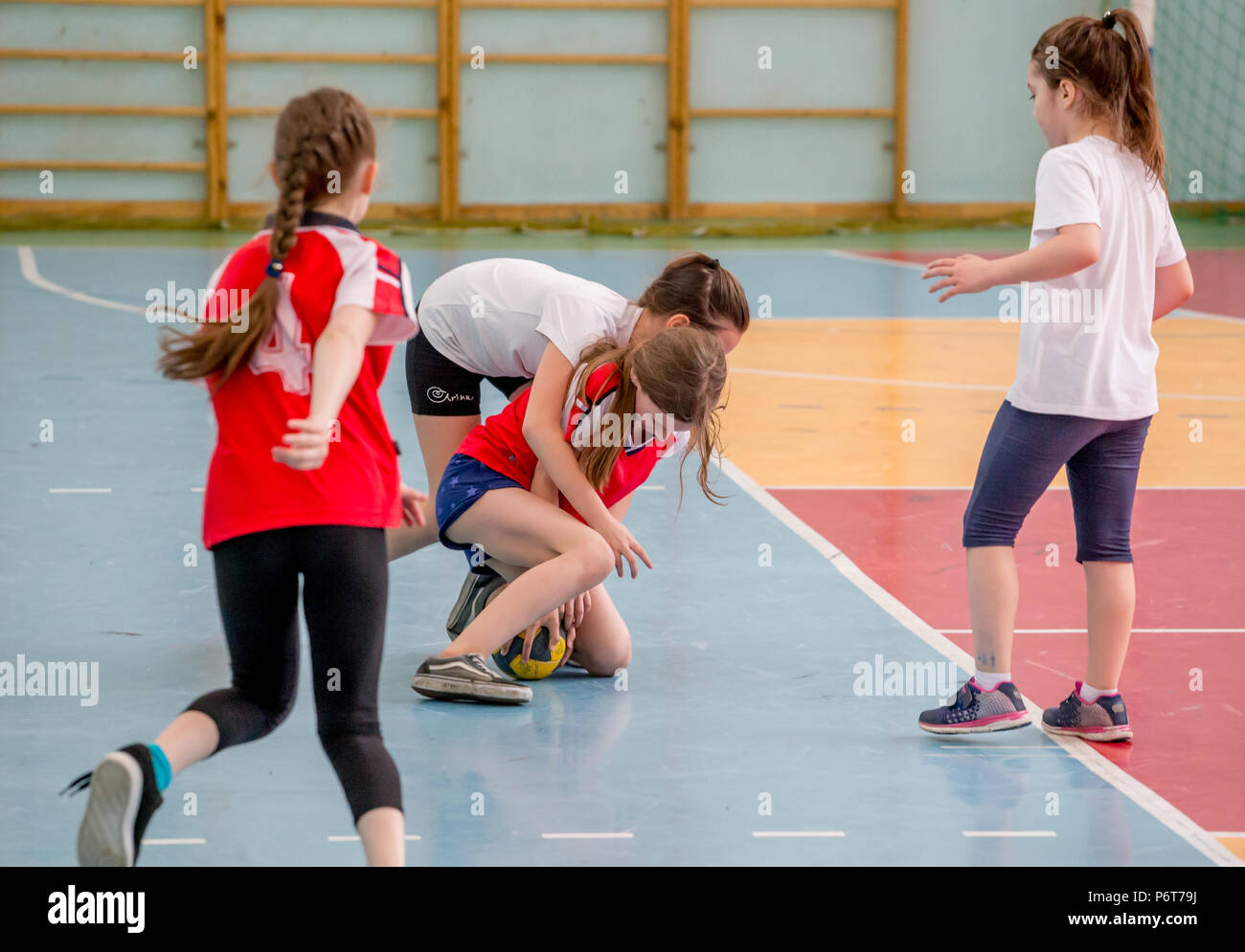 Russia, Vladivostok, 04/28/2018. Kids play handball indoor. Sports and ...
