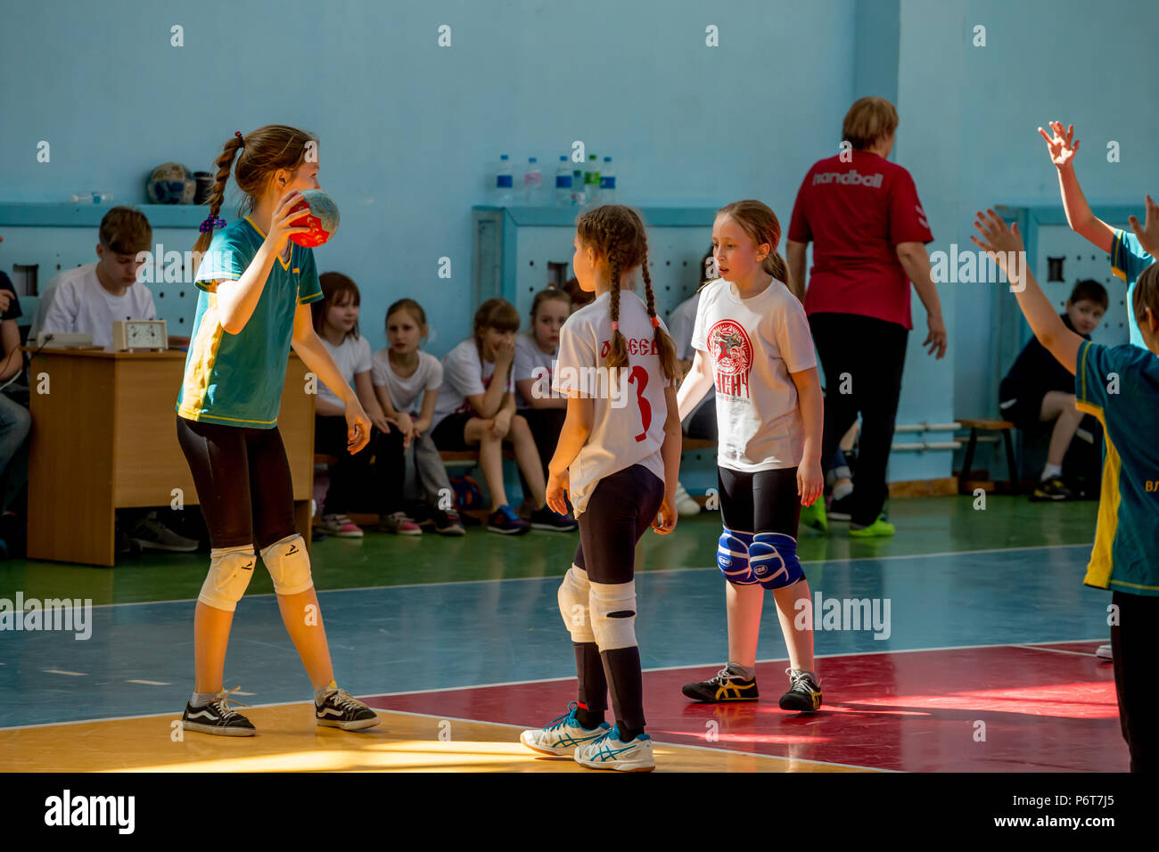Russia, Vladivostok, 04/28/2018. Kids play handball indoor. Sports and ...