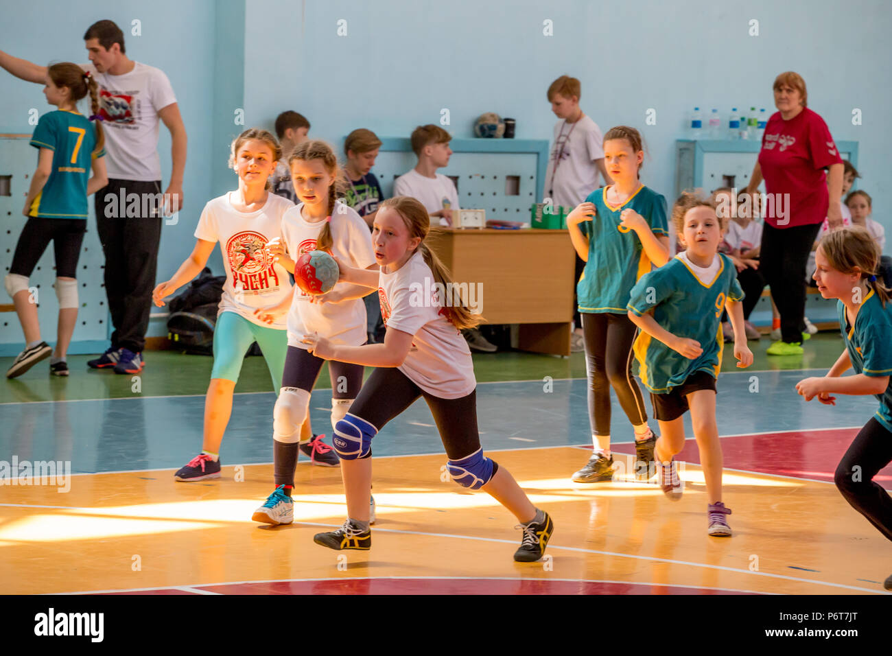 Russia, Vladivostok, 04/28/2018. Kids play handball indoor. Sports and ...