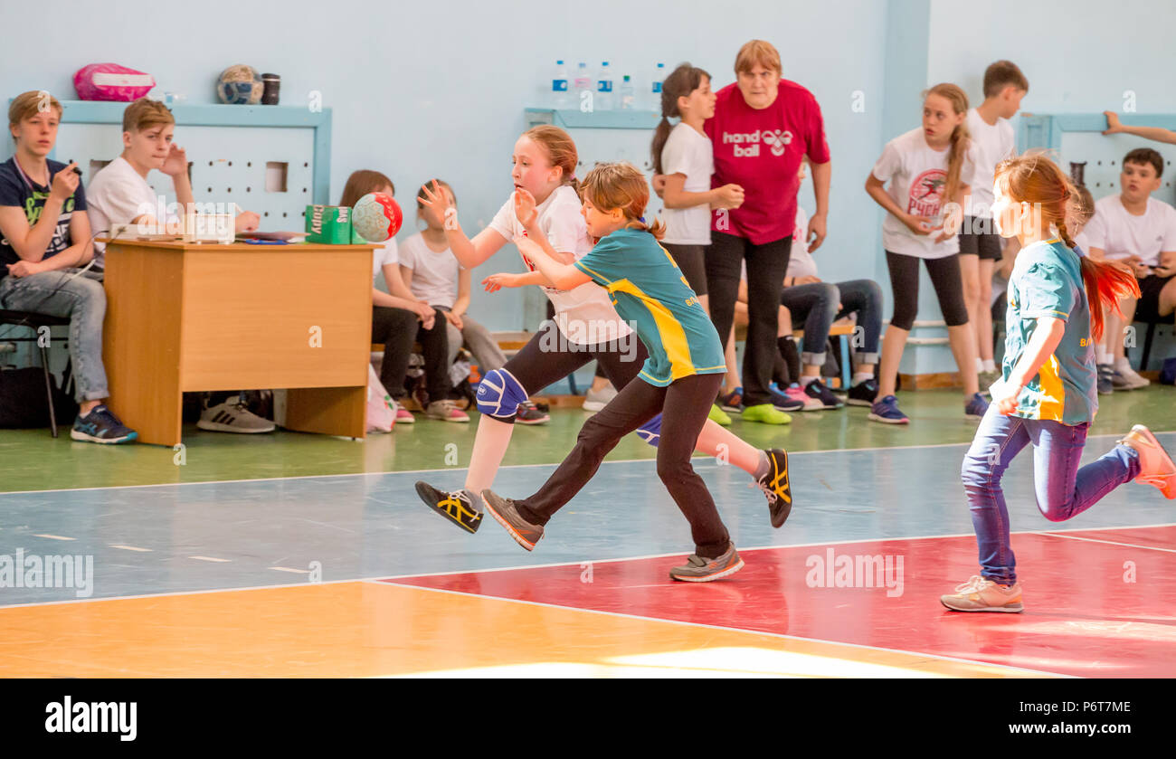 Children playing handball hi-res stock photography and images - Alamy