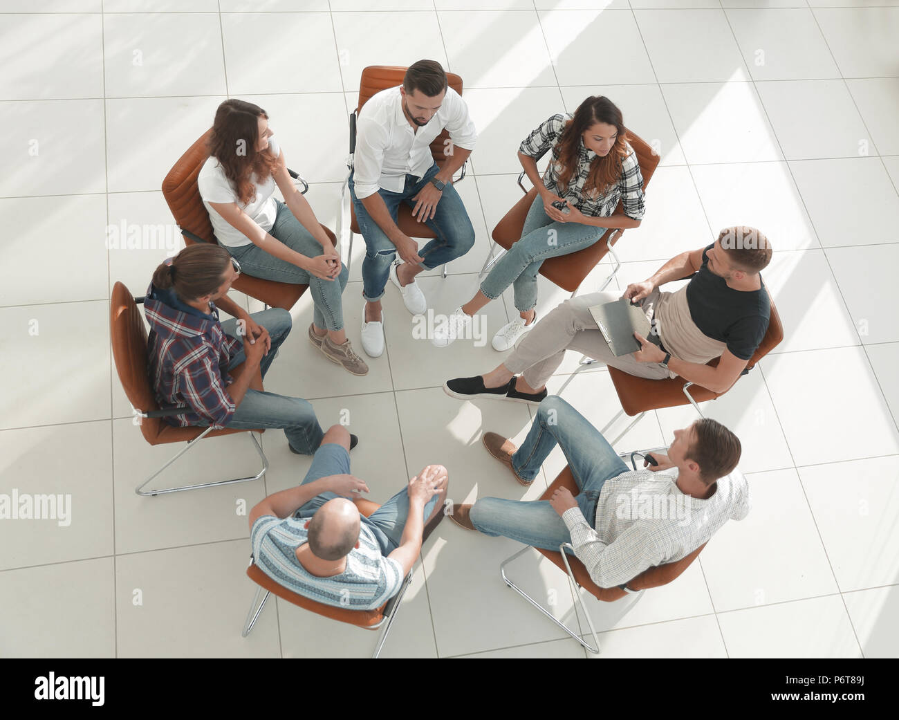 creative team sitting in class for team building Stock Photo - Alamy
