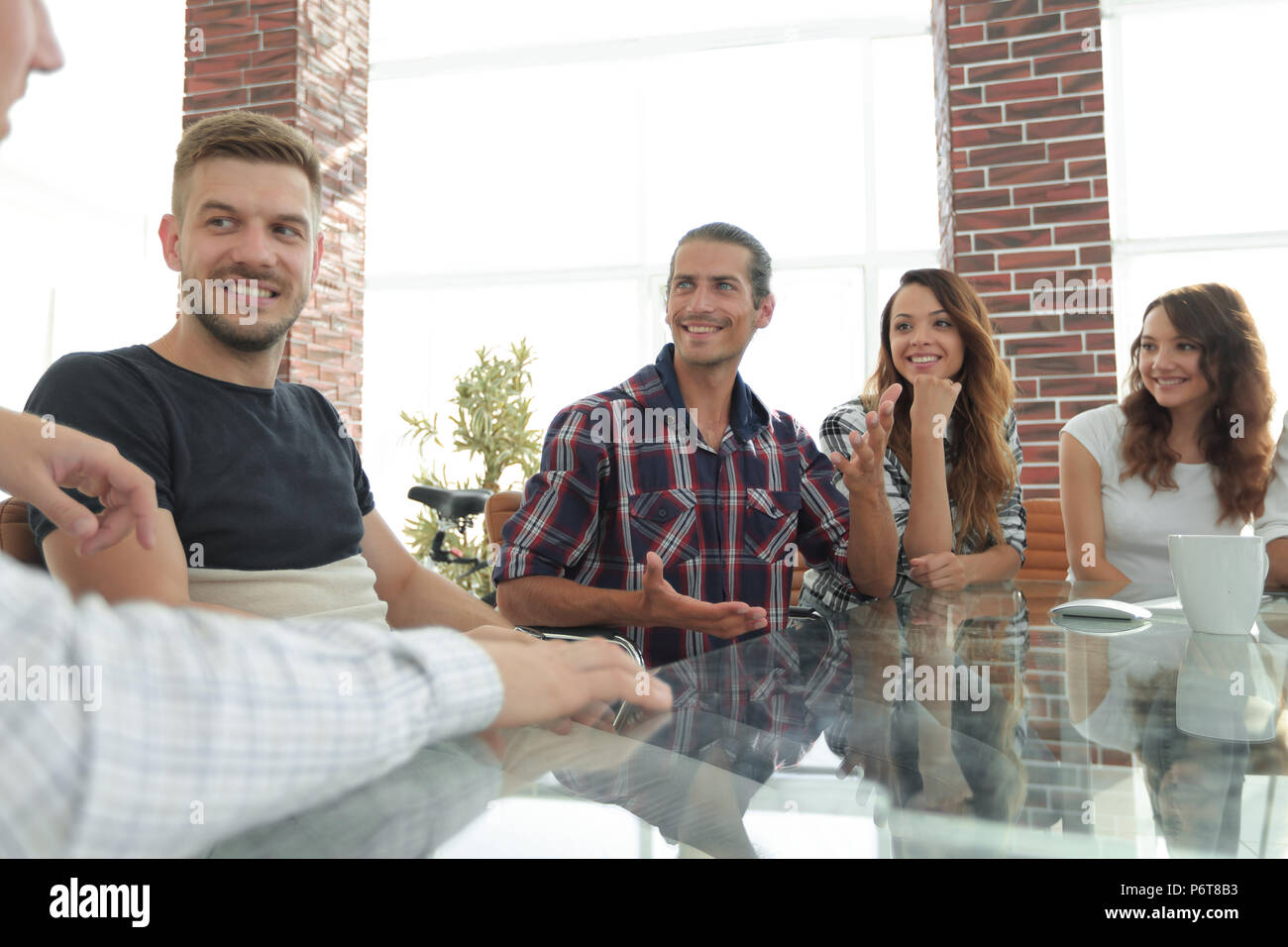 bottom view.creative team talking Stock Photo - Alamy
