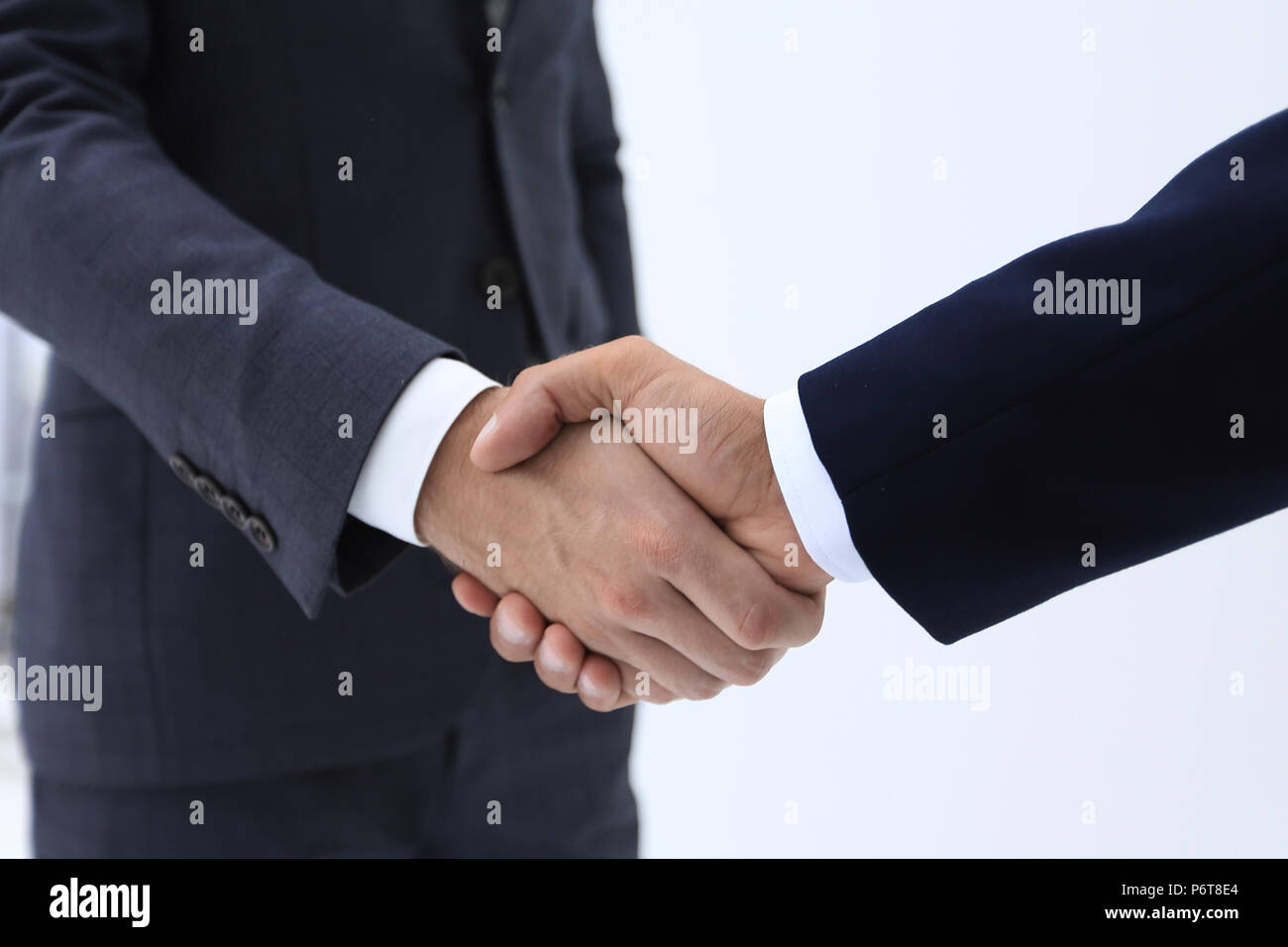 successful businessman invites you to the office Stock Photo - Alamy