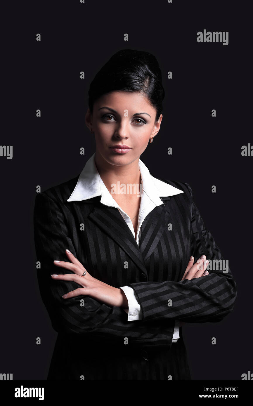 strict business woman on a black background Stock Photo - Alamy