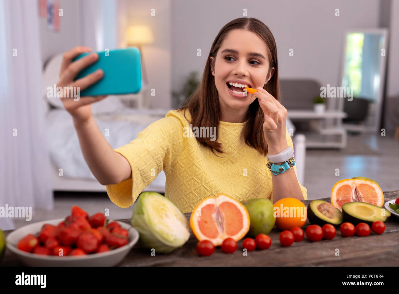 Teenager eating vegetable hi-res stock photography and images - Alamy