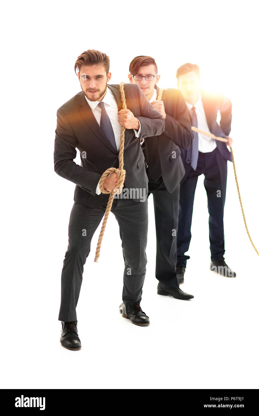 closeup.smiling business team pulls the rope Stock Photo - Alamy