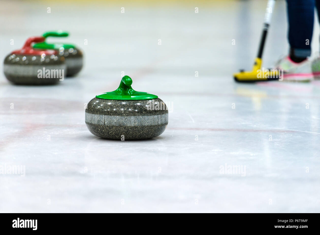 Sliding curling stone hi-res stock photography and images - Alamy