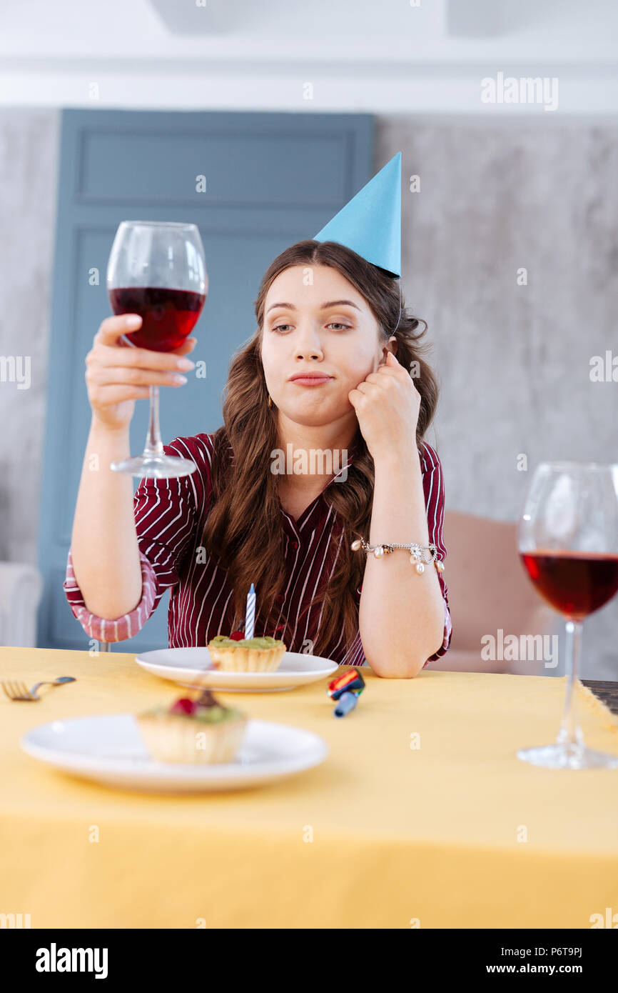 Young woman proposing a toast attending birthday party Stock Photo - Alamy