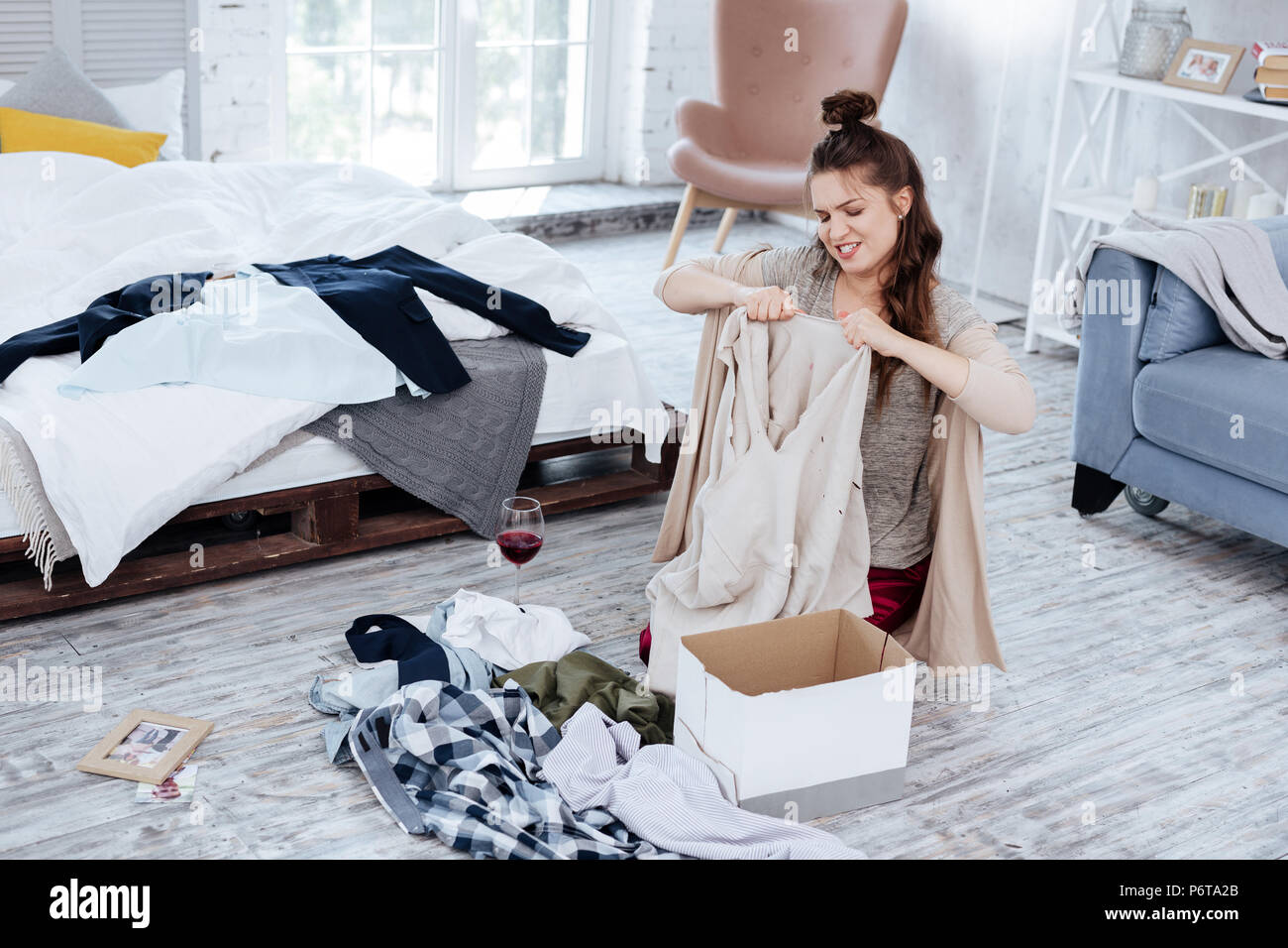 Tear the clothes hi-res stock photography and images - Alamy