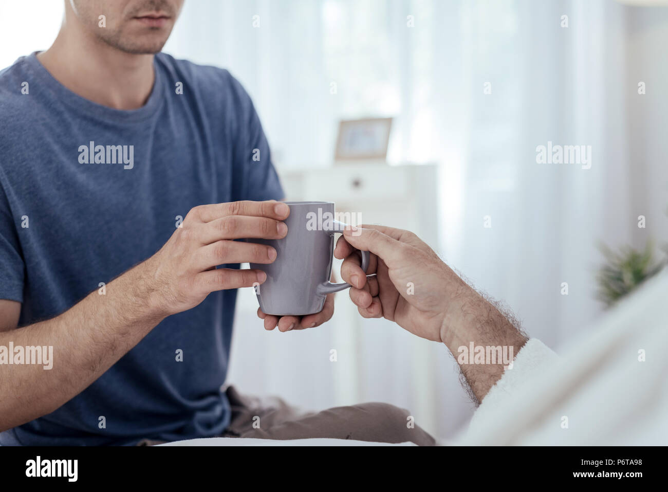 Gerontology hands hi-res stock photography and images - Alamy