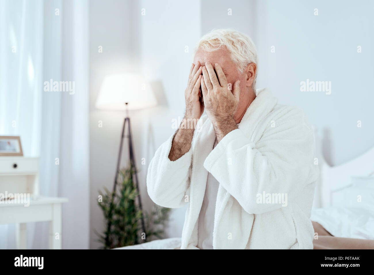 Handsome senior man crying Stock Photo - Alamy