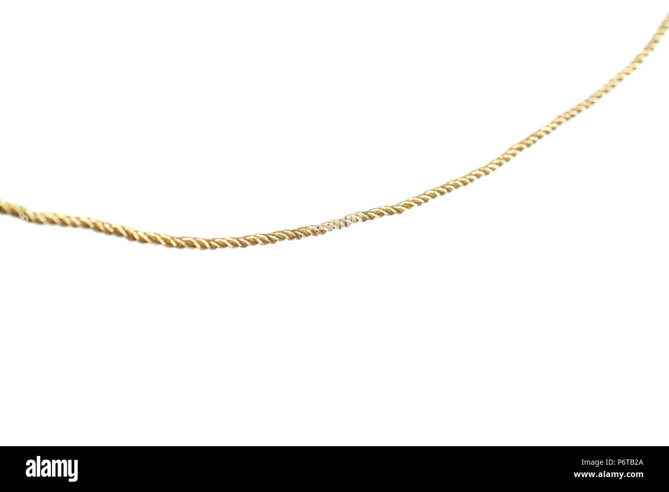 Golden rope isolated on a white background Stock Photo - Alamy