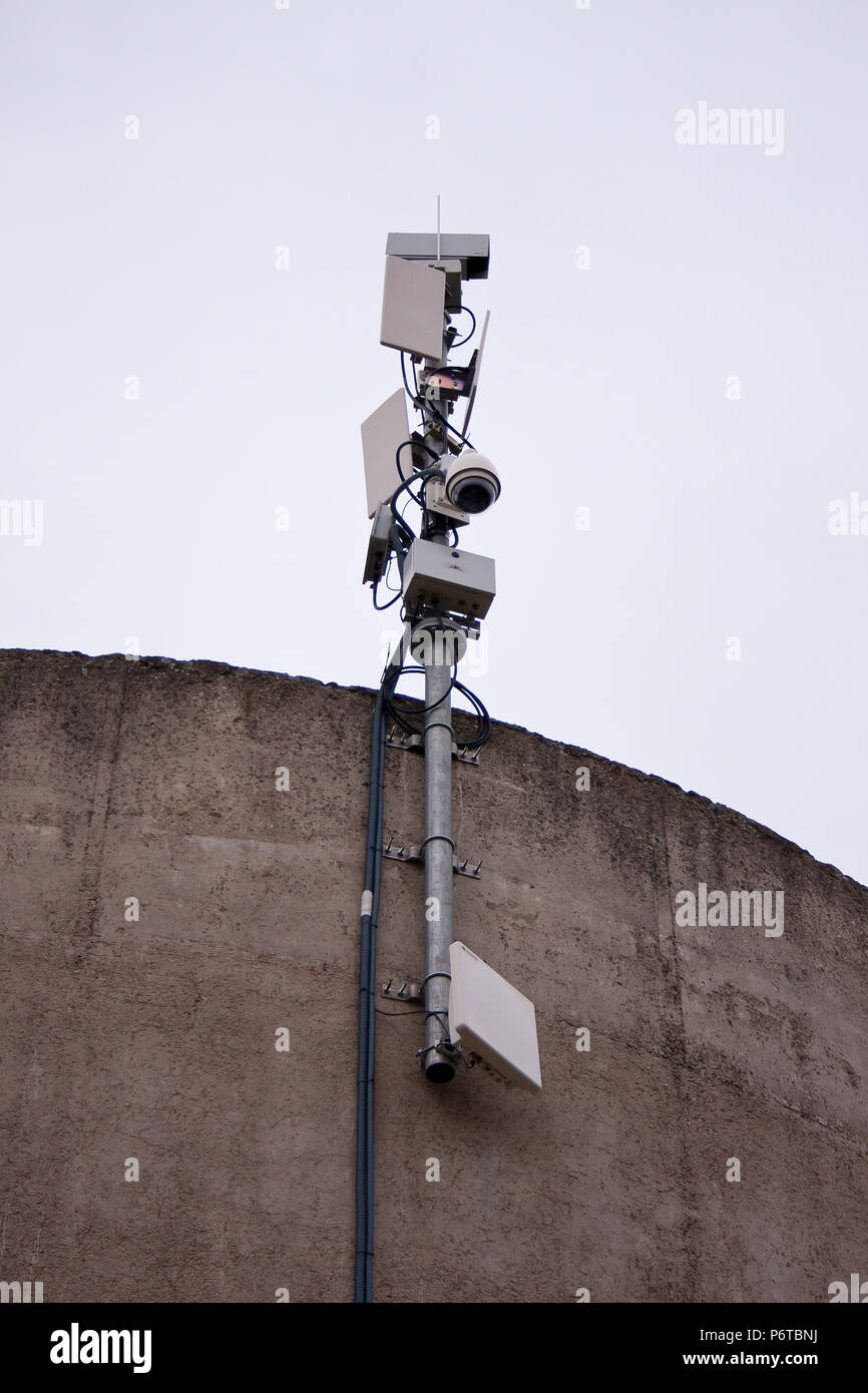 video surveillance post on concrete tower control areas Stock Photo - Alamy