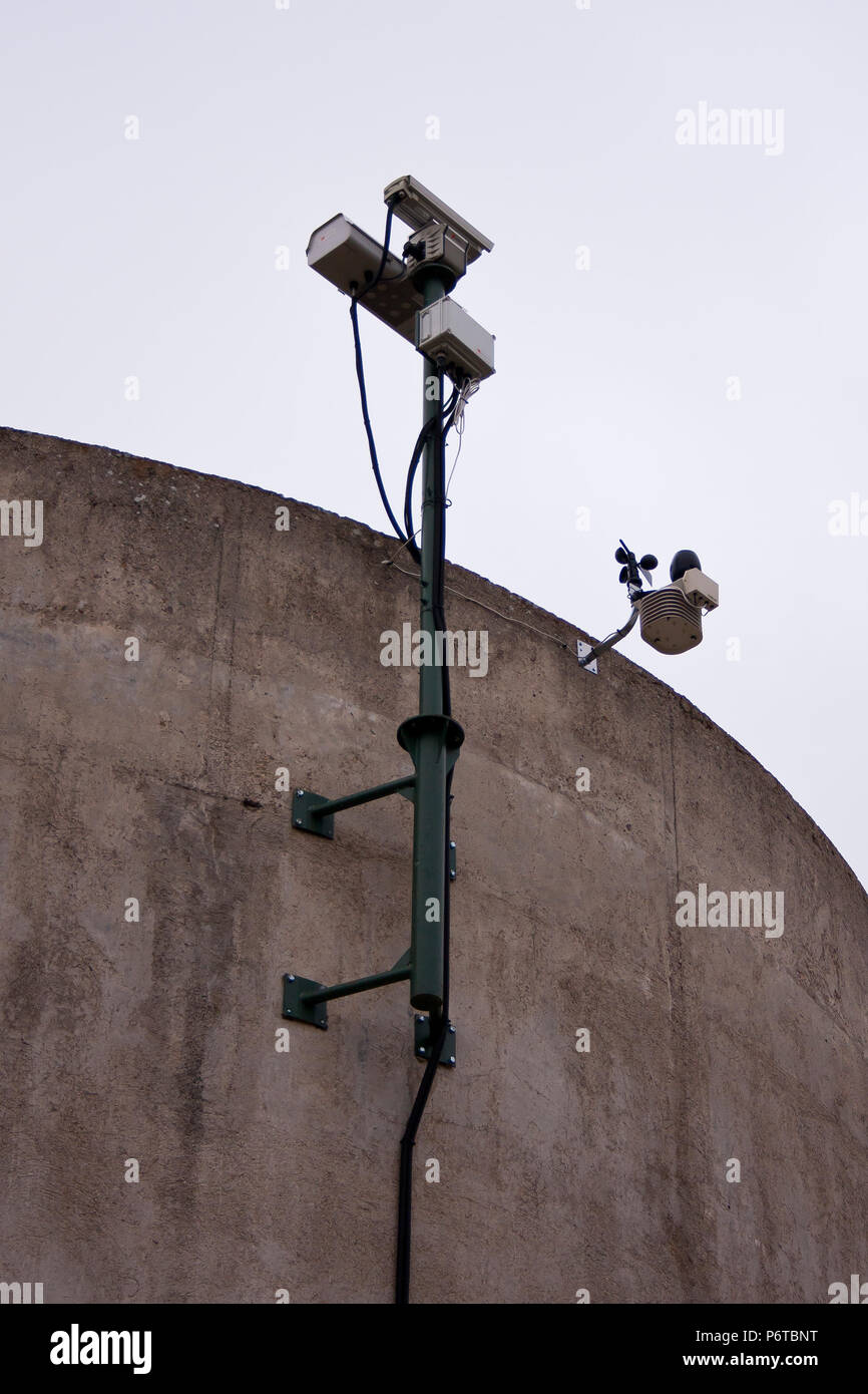 video surveillance post on concrete tower control areas Stock Photo - Alamy