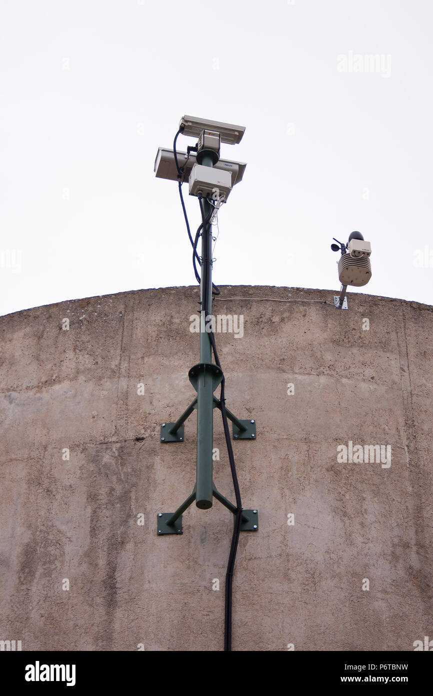 video surveillance post on concrete tower control areas Stock Photo - Alamy