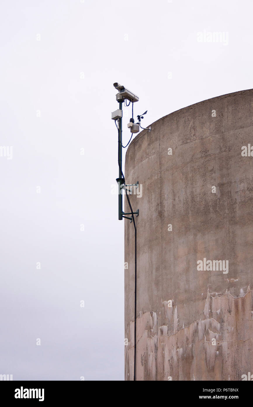 video surveillance post on concrete tower control areas Stock Photo - Alamy