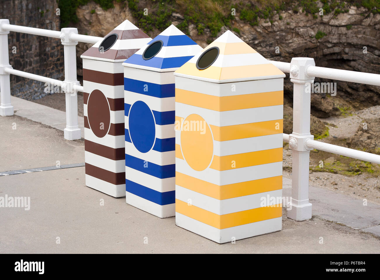 three bins to recycle organic waste, cans and paper Stock Photo - Alamy