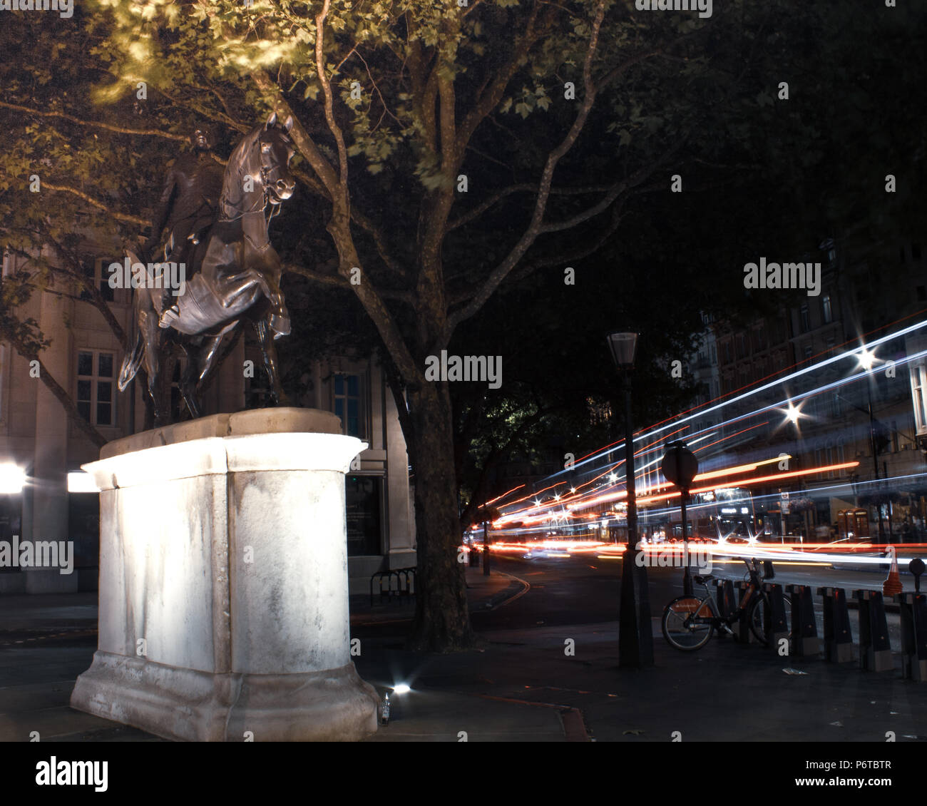 Statue Light trails Stock Photo - Alamy