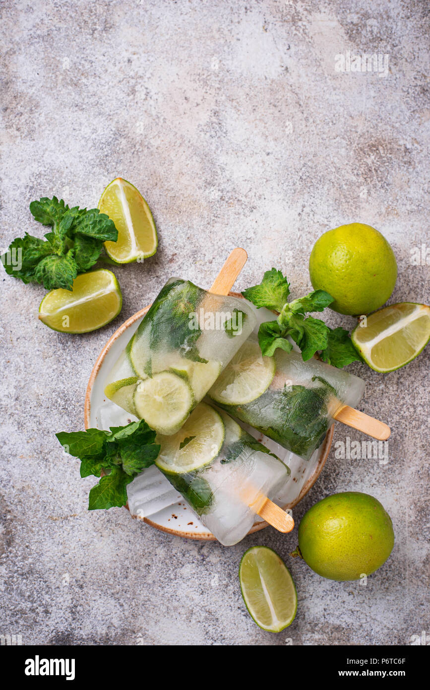 Mojito cocktail popsicle with mint, lime and rum Stock Photo - Alamy