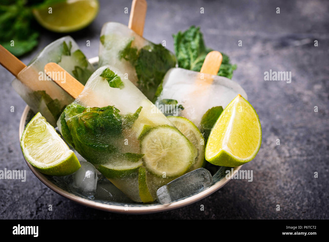 Mojito cocktail popsicle with mint, lime and rum Stock Photo - Alamy