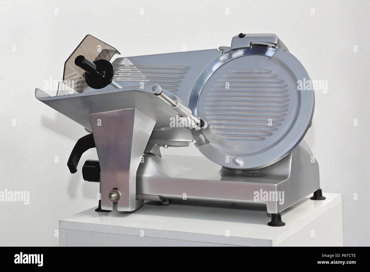 Semi Automatic meat and ham slicer machine Stock Photo - Alamy Semi Automatic meat and ham slicer machine Stock Photo - Alamy