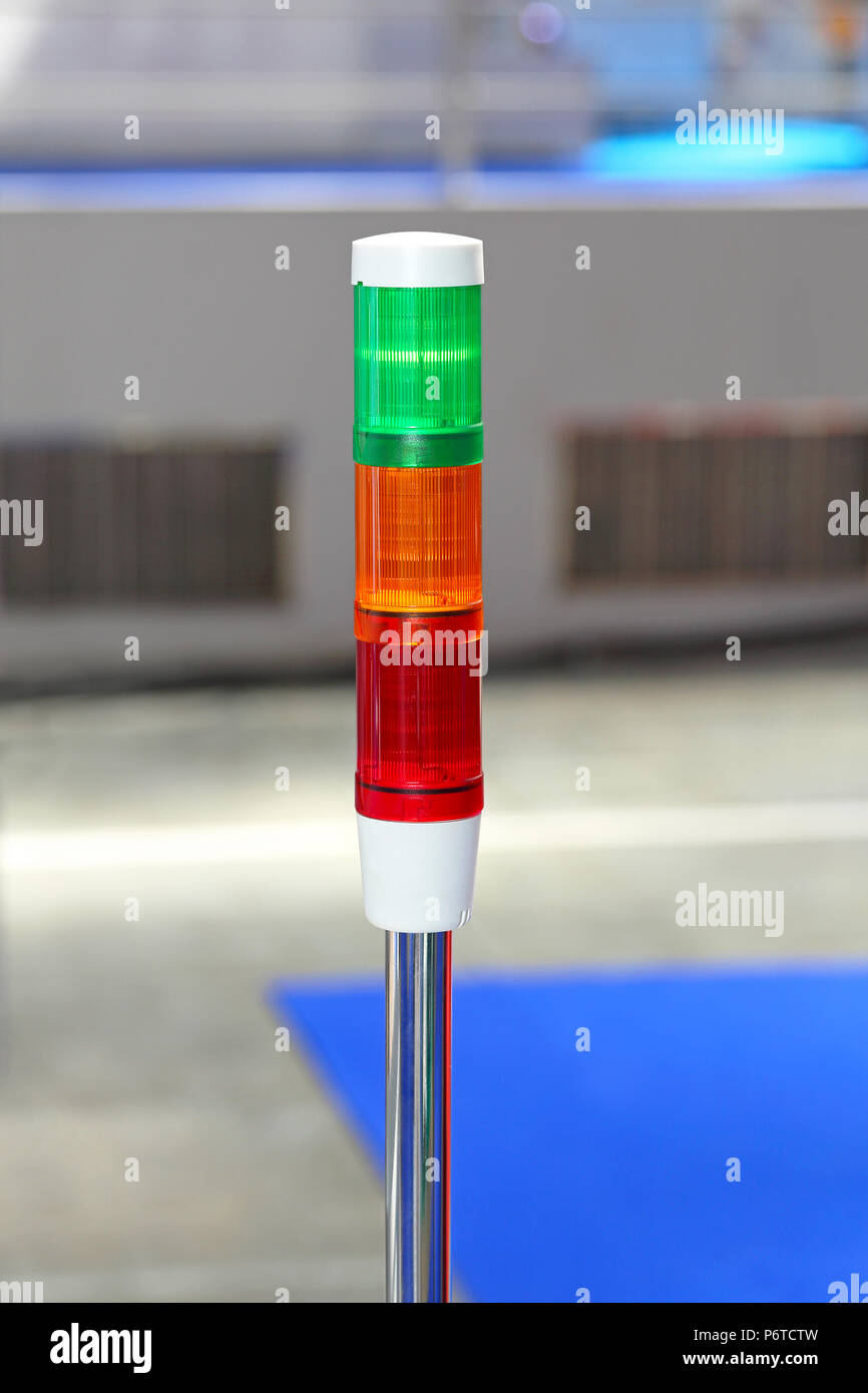 Stack light indicator at pole in factory Stock Photo - Alamy