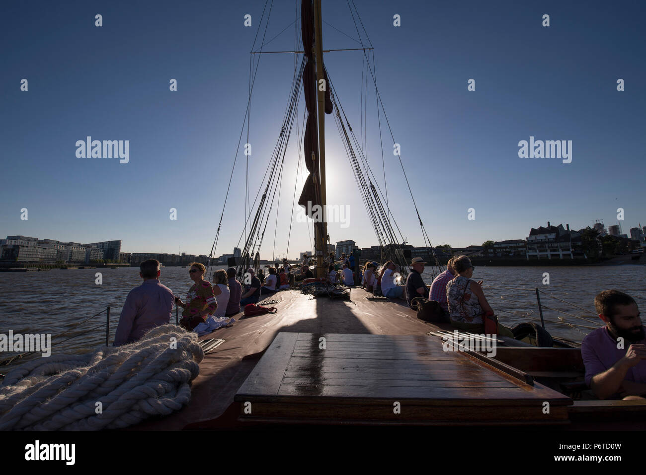 sailing into the sunset on a sail barge - river thames - london Stock ...