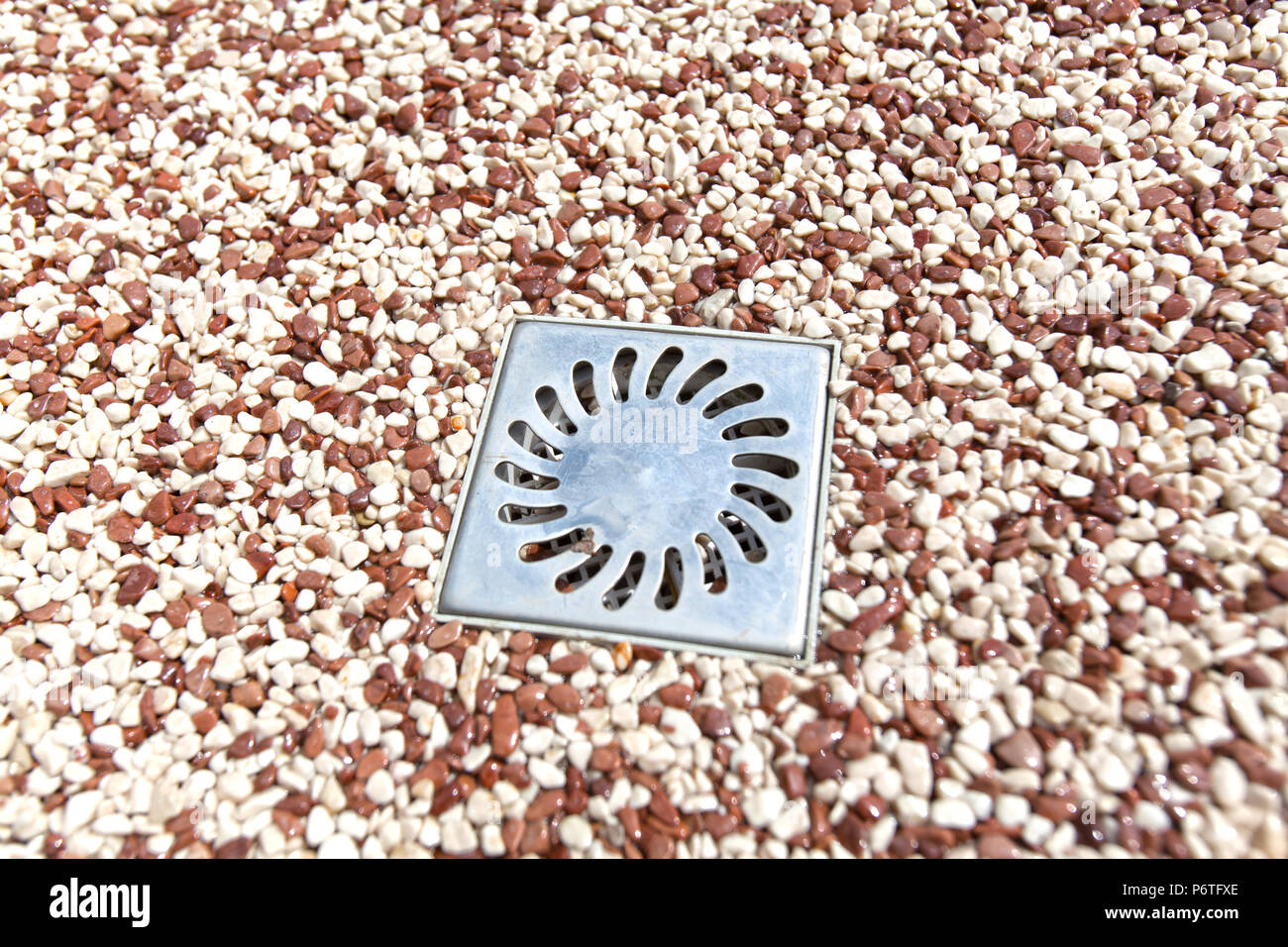 Texture of pebbles in an exposed aggregate foundation Stock Photo - Alamy