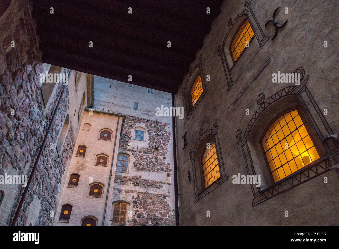 Walls and windows of courtyard of Turku Caste evening dusk Stock Photo ...
