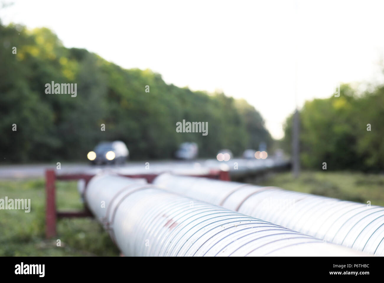 Metal pipes on the street. pipes from the pipeline. gas pipeline for ...