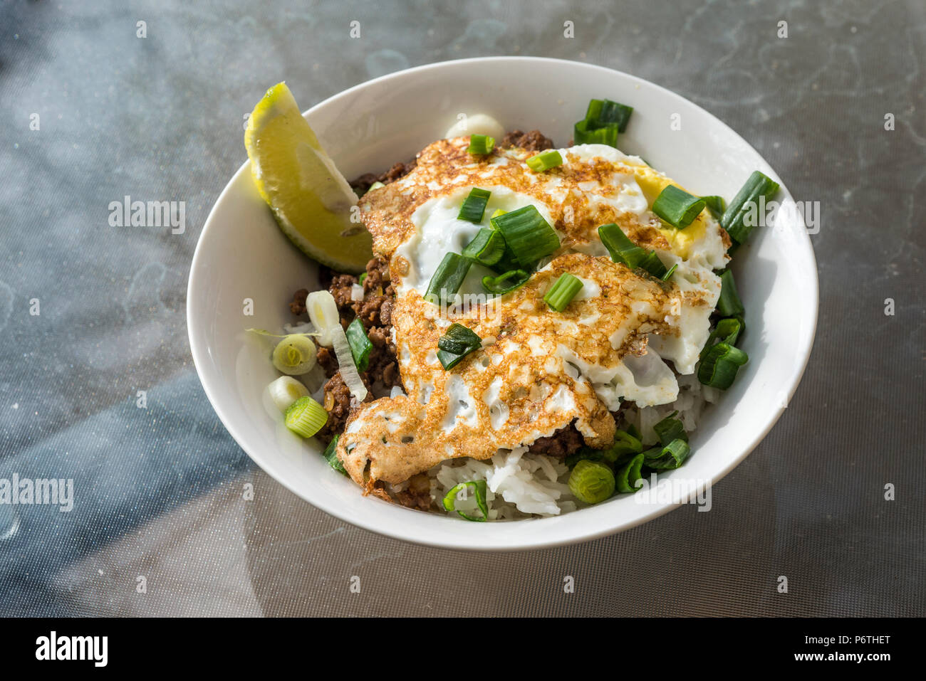 Thai food, Pahd kapao with fried egg Stock Photo - Alamy