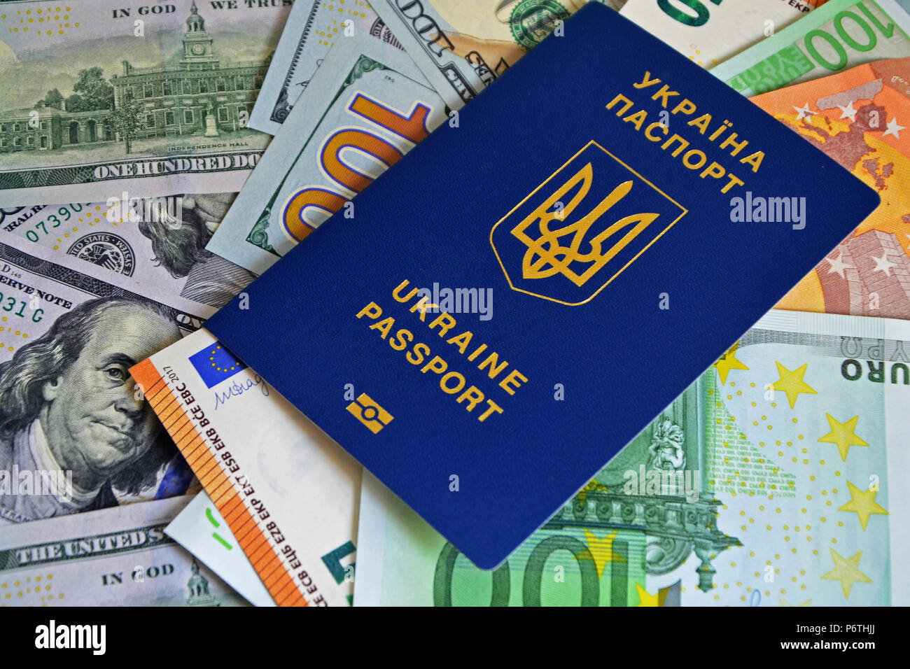 The Ukrainian biometric passport is on paper euro bills and dollars ...