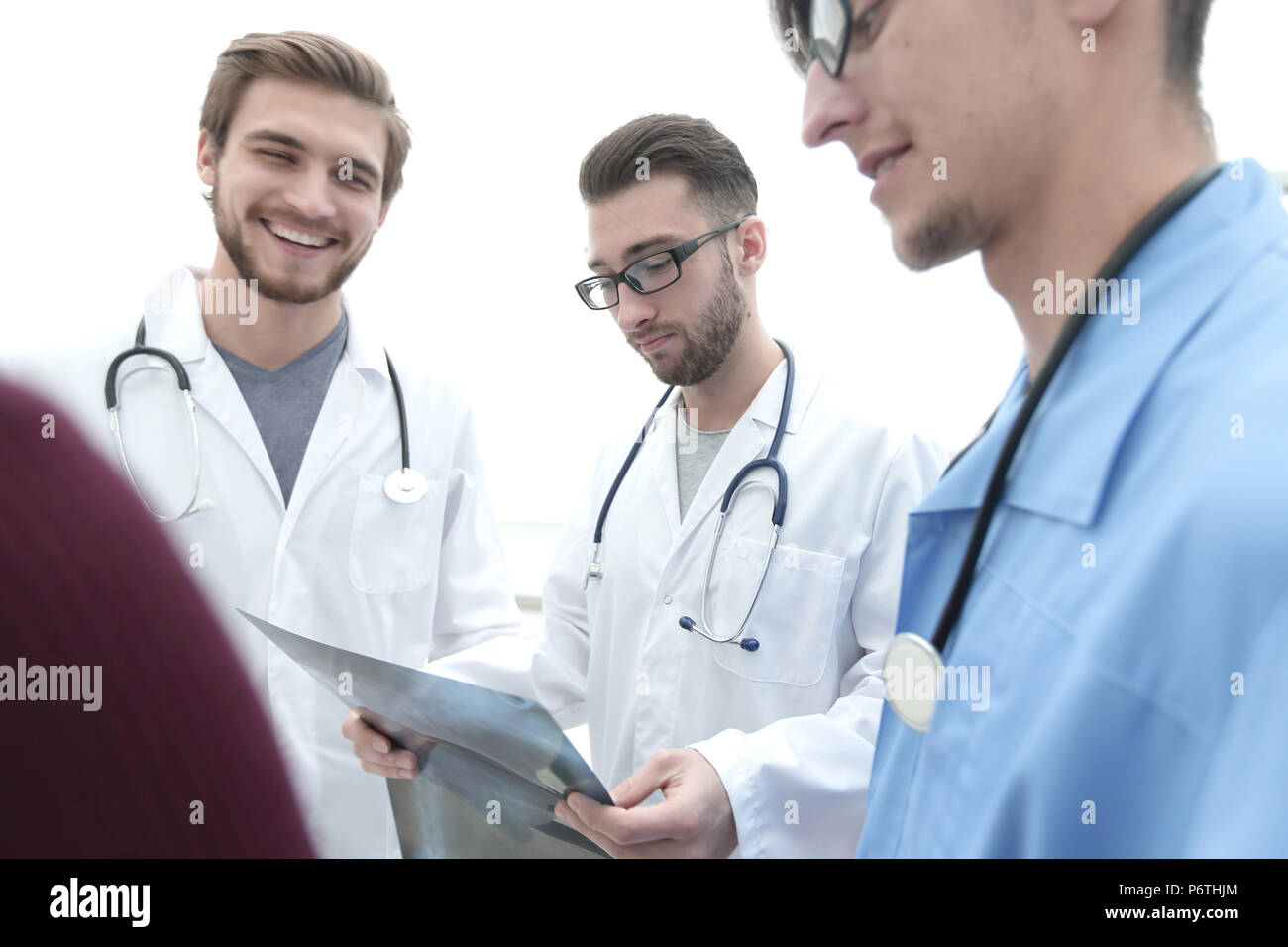 group of doctors advising the patient Stock Photo - Alamy
