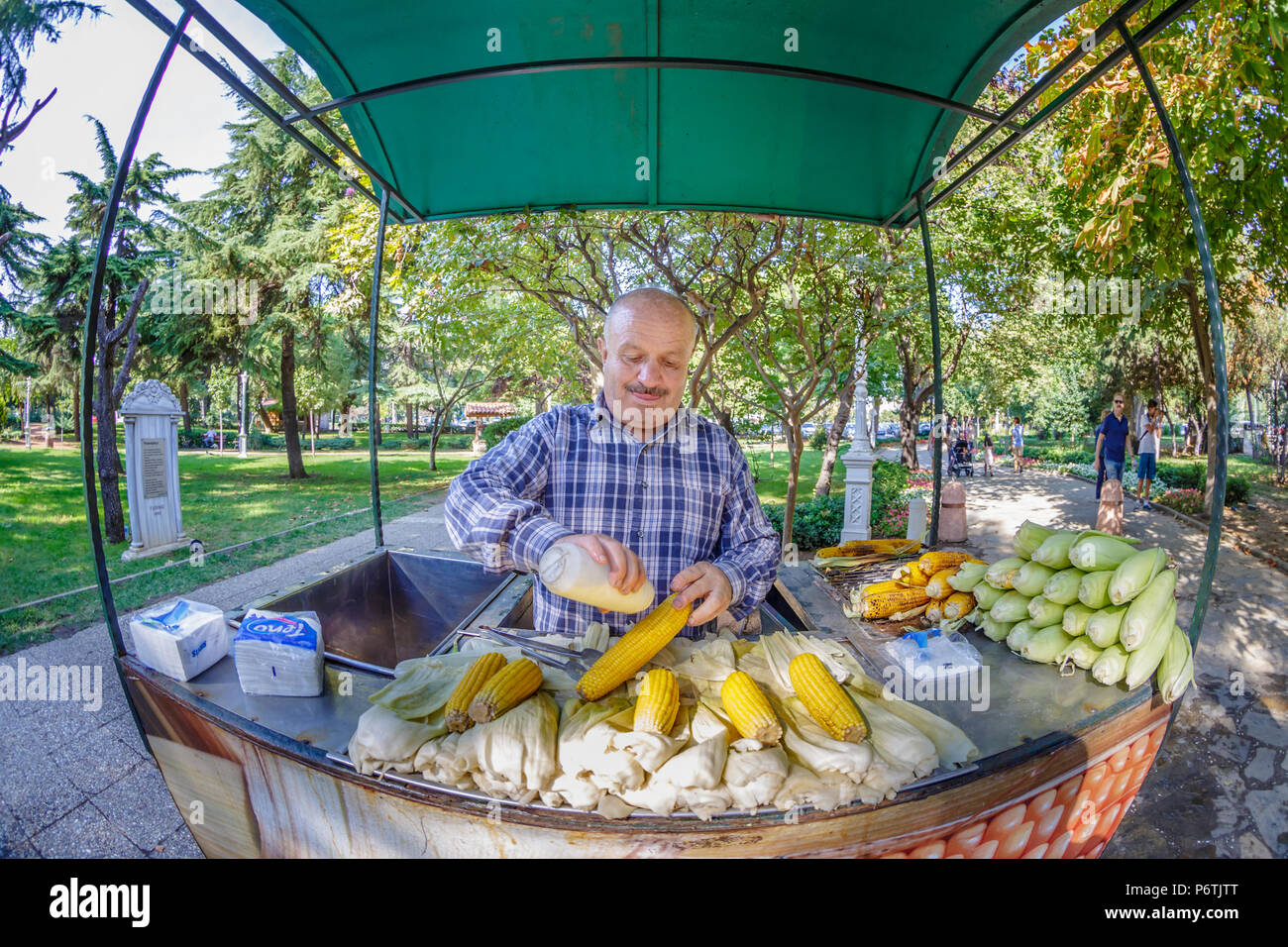 Man selling corn hi-res stock photography and images - Alamy